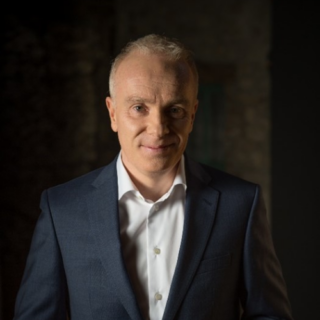 Biography of Richard Curran - M&A Worldwide